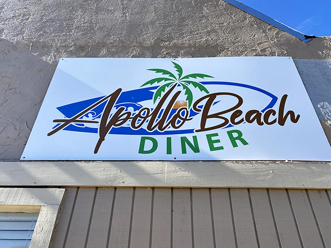 The sign that signals salvation for the breakfast-deprived. That palm tree isn't just decoration—it's a promise of Florida hospitality.
