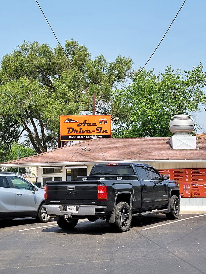 The drive-up experience: Where your car becomes the best dining room in town, with service that hasn't changed since tail fins were in fashion.