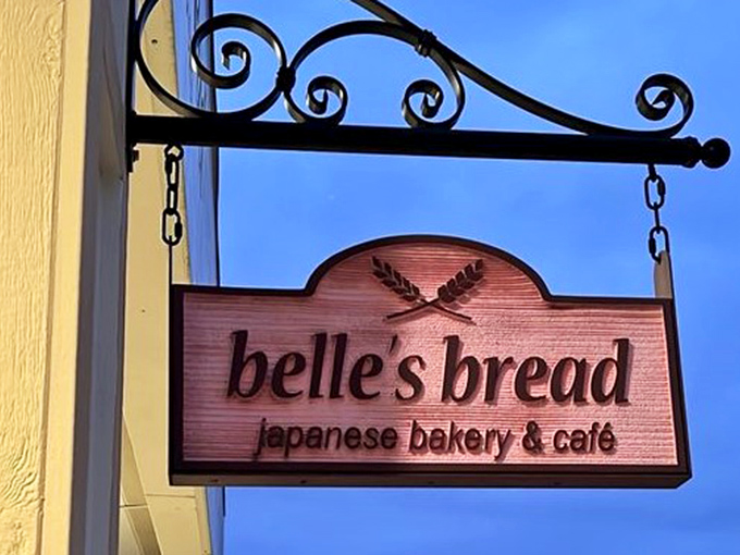 The wooden sign swings gently, like a portal between worlds. "Belle's Bread" isn't just a name&mdash;it's a promise of Japanese baking excellence in Columbus.