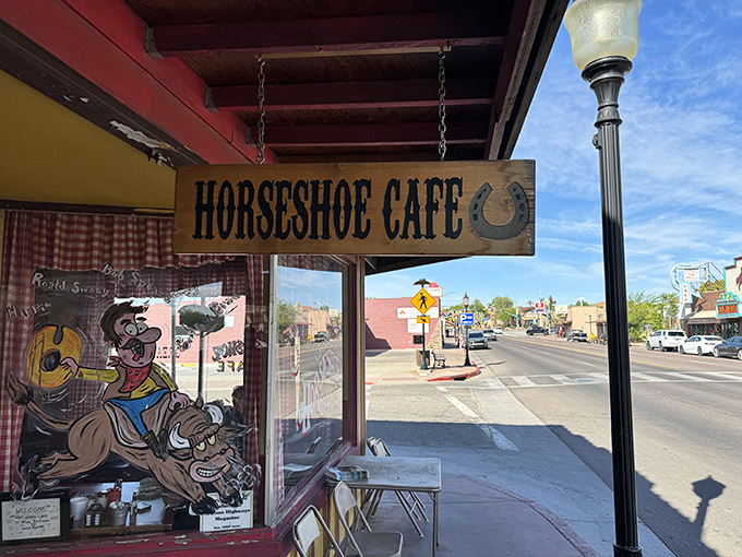 The wooden sign swinging gently above the sidewalk has guided hungry travelers to this corner for generations of good eating.