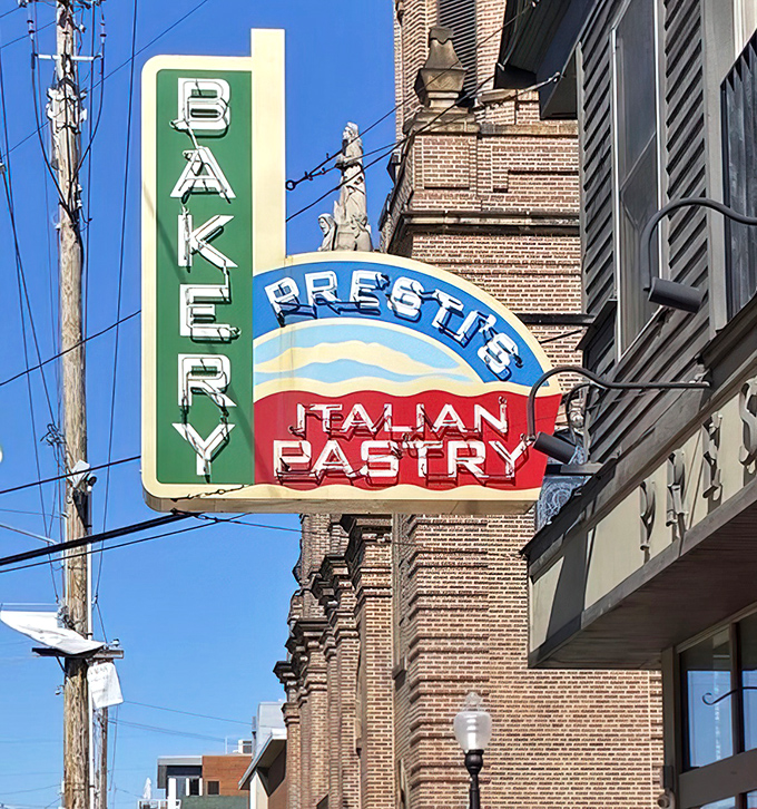 Against the blue Cleveland sky, Presti's vintage neon sign has guided generations of sweet-toothed pilgrims to this temple of Italian pastry.
