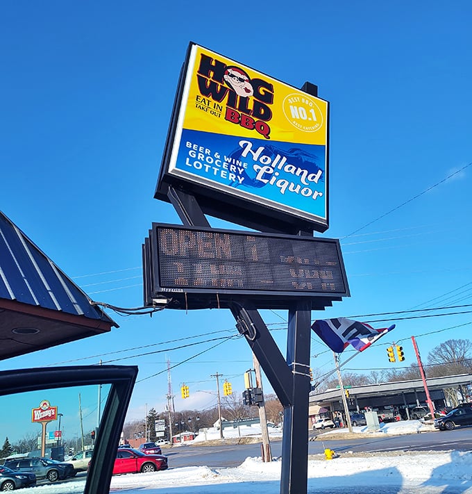 This sign doesn't just mark a location; it's a beacon of hope for the hungry and a landmark for those who appreciate proper smoke rings.