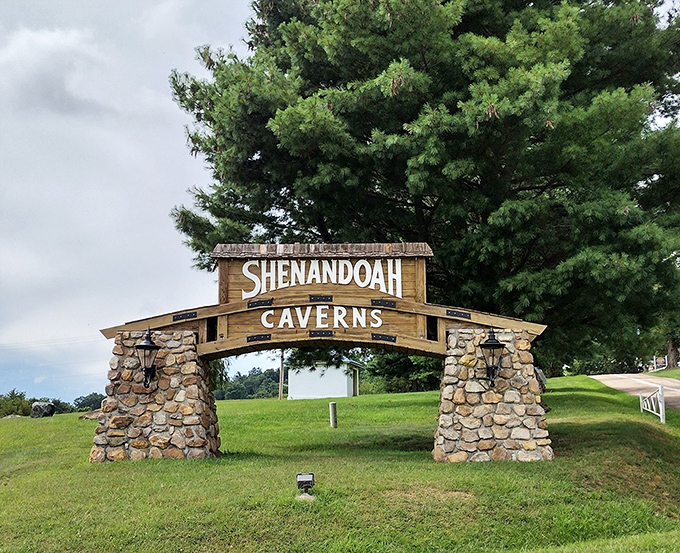 Your adventure begins here: The rustic stone entrance sign welcomes curious explorers to one of Virginia's most spectacular natural wonders.