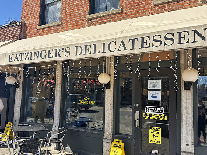 The storefront sign serves as a beacon of hope for the sandwich-deprived, promising deliverance from hunger one pickle at a time.