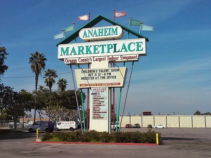 The retro sign stands like a mid-century modern lighthouse, guiding bargain hunters to the promised land of deals and discoveries.