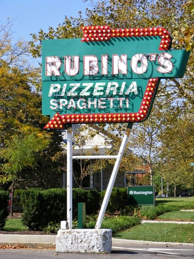That neon sign has guided hungry Ohioans through decades of dinner decisions, a mid-century modern masterpiece of pizza advertising.