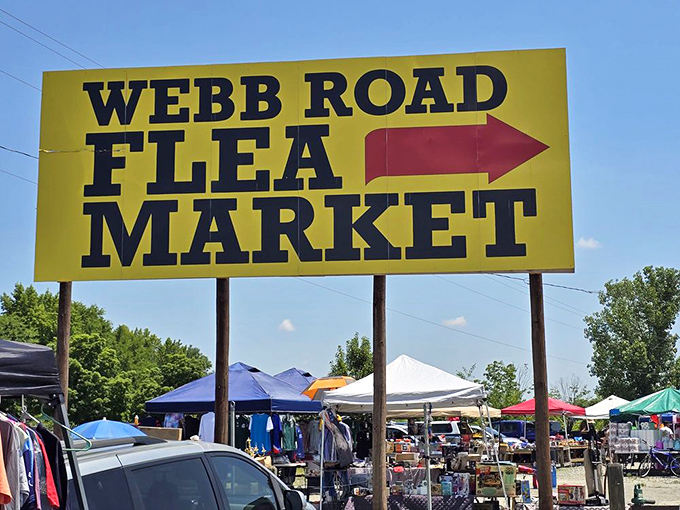 Follow the yellow sign to happiness! This roadside beacon has guided generations of treasure hunters to weekend adventures and unexpected finds.