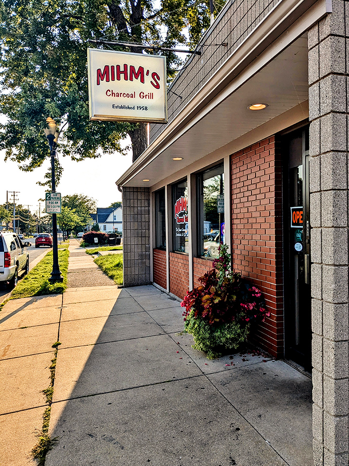 Standing proud since 1958, like a beacon calling hungry travelers to charcoal-grilled salvation.