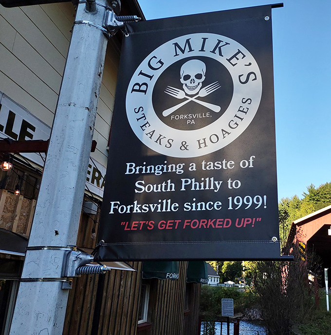 The unofficial coat of arms of Forksville since 1999&mdash;a skull and crossed utensils that don't say "danger" but rather "deliciousness ahead."