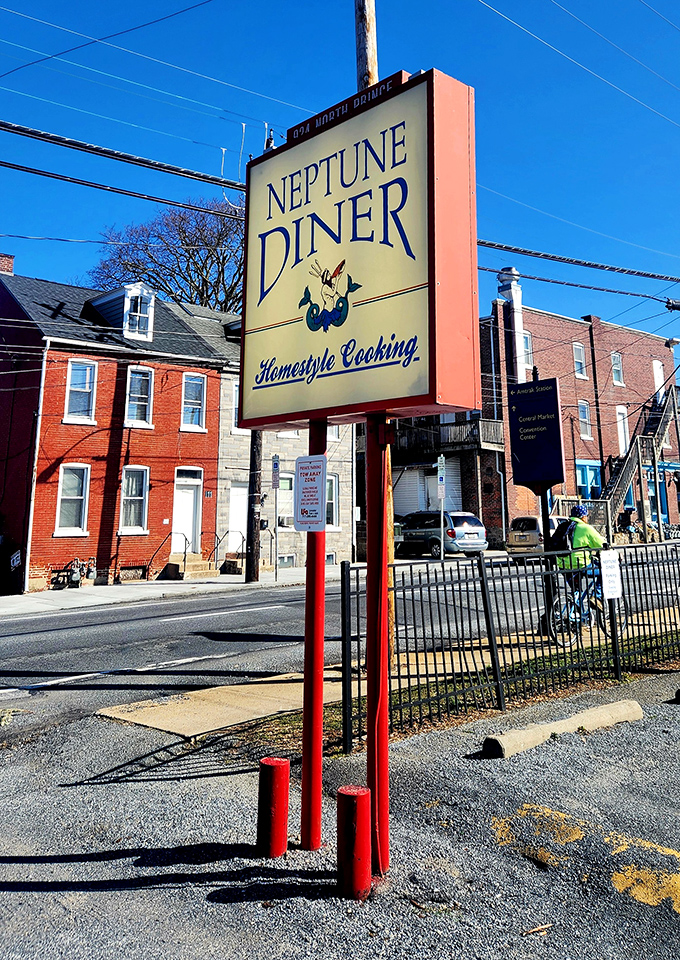 The sign stands tall against the blue Pennsylvania sky, a beacon for hungry travelers and locals alike seeking homestyle cooking.