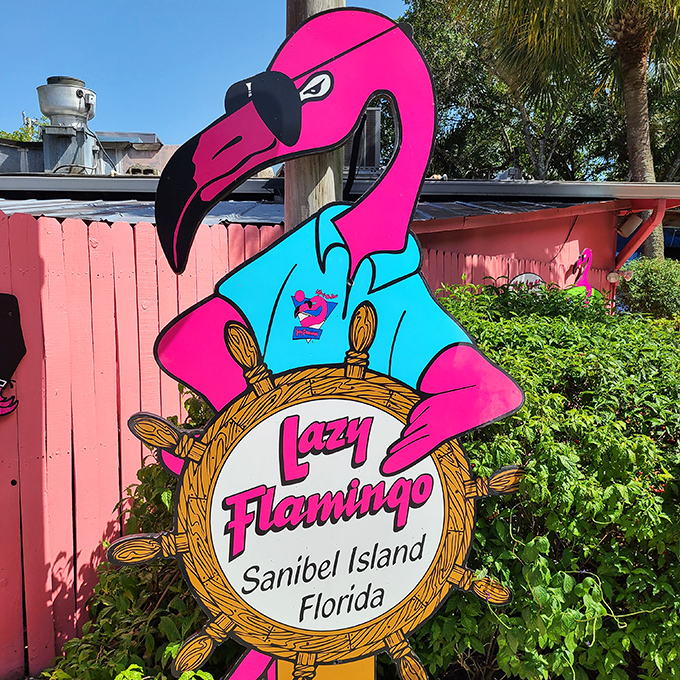Not just a sign, but a landmark. This sunglass-wearing flamingo has guided hungry travelers to seafood salvation for years, standing proud in tropical splendor.