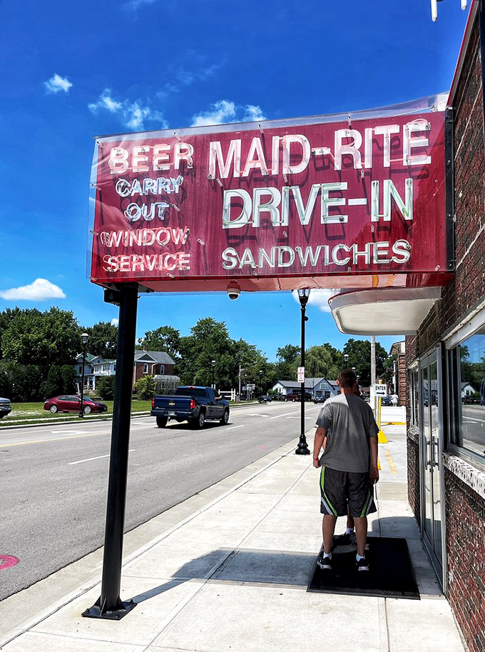 Standing the test of time. This weathered sign has witnessed countless Ohio summers while promising the same delicious experience year after year.