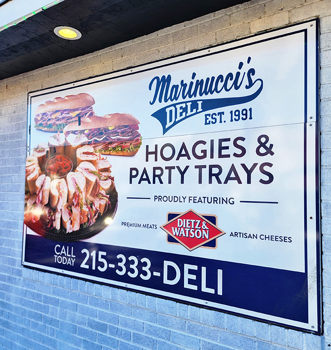 This sign doesn't just advertise a deli; it announces a Philadelphia institution where bread, meat, and cheese achieve harmony.