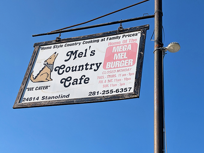 The roadside sign featuring Mel's howling coyote logo&mdash;a beacon of hope for the hungry traveler and a promise of homestyle satisfaction.