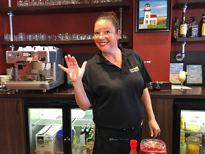 Service with a genuine smile makes everything taste better. When your server is this happy, you know you've chosen the right breakfast spot.