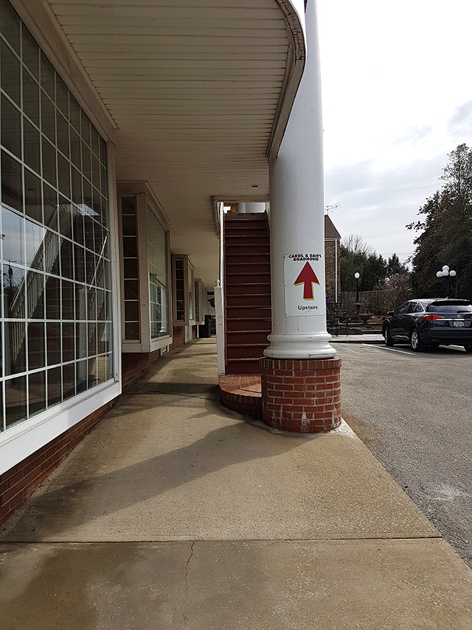 Follow the arrow up these stairs and you're not just heading to dinner—you're embarking on a meatloaf pilgrimage that Pennsylvania food lovers speak of in reverent tones.