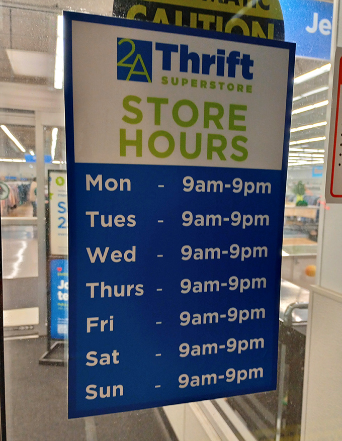 The store hours sign: a thrifter's schedule of opportunity. Open 9-9 every day because bargain hunting waits for no one!