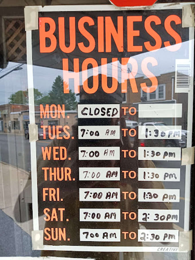 Hours posted with the confidence of a place that knows exactly what it is. Closed Mondays because even diners need to catch their breath.