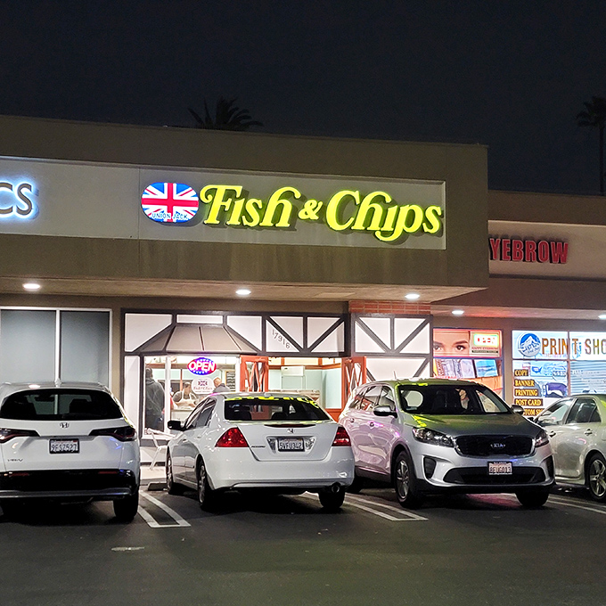 As night falls, the neon glow beckons hungry travelers. Like a lighthouse for the famished, Union Jack's illuminated storefront guides you to fried nirvana.