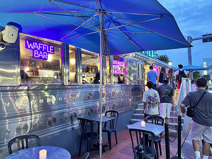 The "Waffle Bar" neon sign isn't just advertising&mdash;it's poetry. At night, this diner transforms into South Beach's most delicious disco.