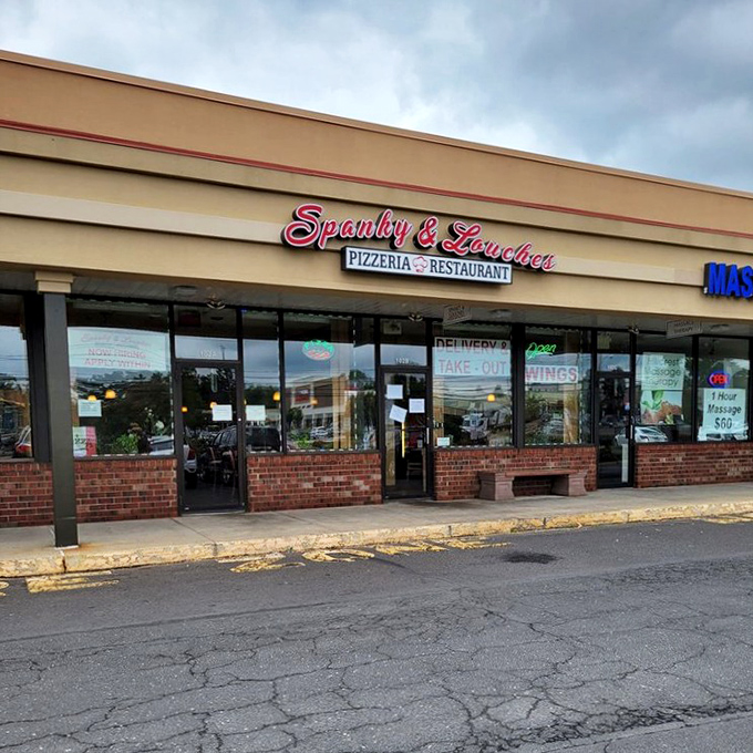 The pink neon sign glows like a beacon for hungry travelers, promising authentic Italian-American comfort food in this corner of Pennsylvania.