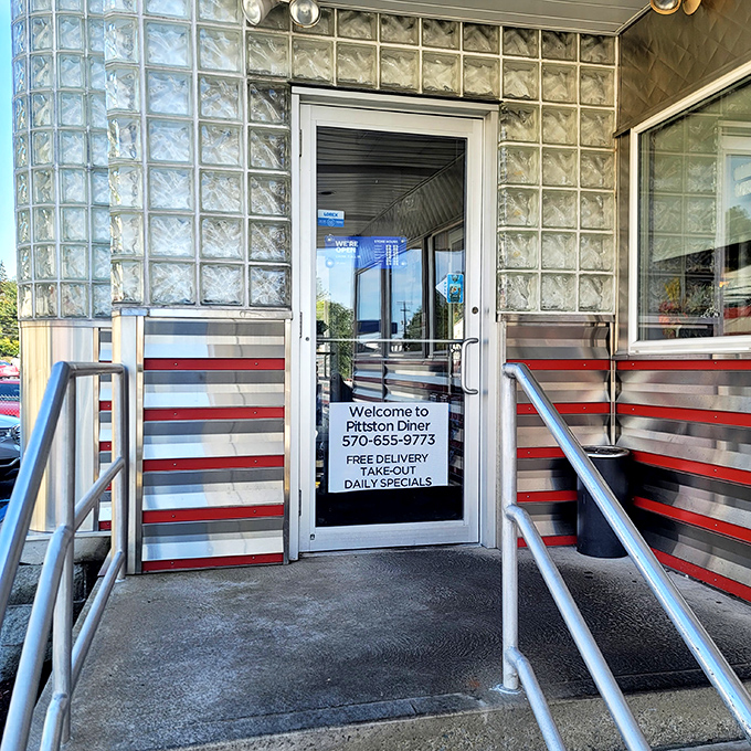 The entrance to breakfast paradise&mdash;where glass blocks and red stripes promise that inside, calories don't count and coffee refills are endless.