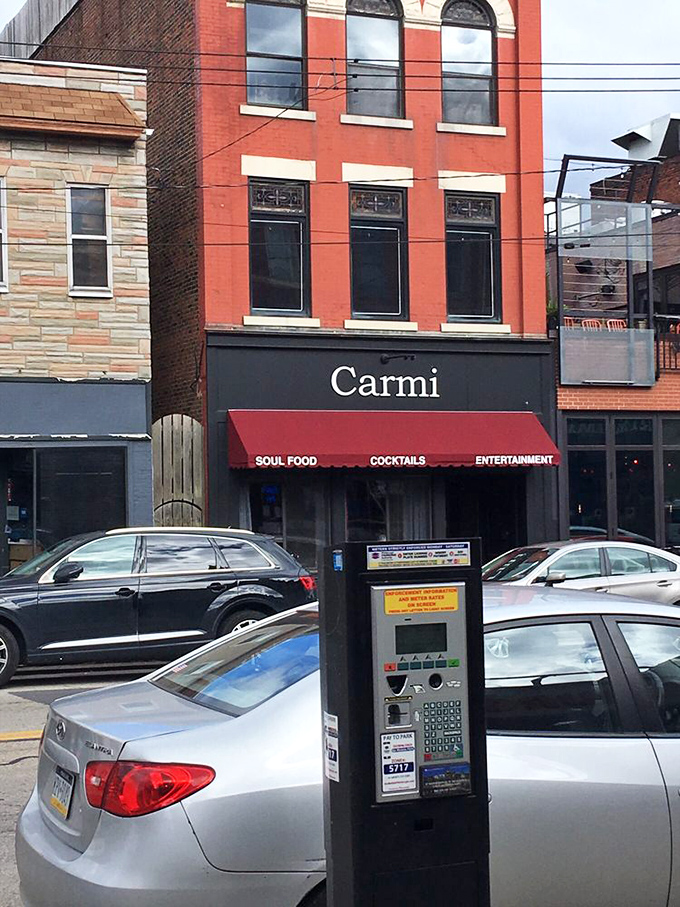 Street parking available, but you'd happily walk miles for what awaits inside. The red awning signals you've arrived at flavor central.