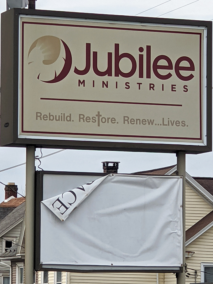 The Jubilee Ministries sign reveals the mission behind the merchandise&mdash;a reminder that your bargain hunting supports community programs with every purchase.