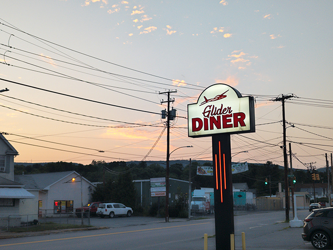 Even the street sign knows this place is special, standing proud like a beacon for hungry travelers seeking real food.