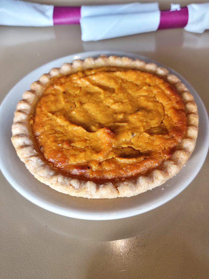 Sweet potato pie with a crust so perfectly crimped it deserves its own Instagram account and filling that tastes like Southern sunshine.