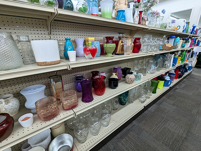 Dishware stacked like ceramic soldiers, each piece ready to serve meals in its next loving home.