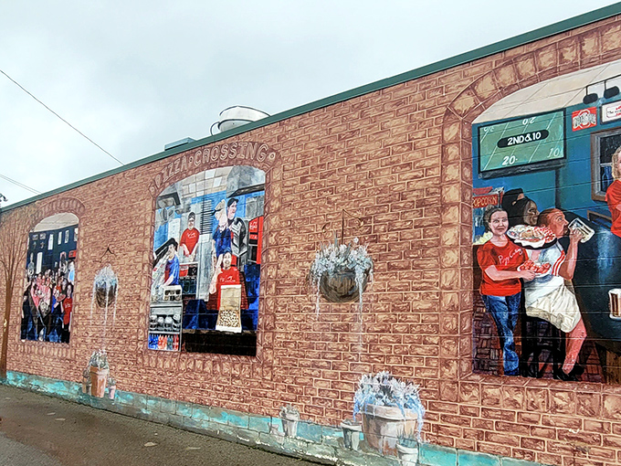 The colorful mural outside celebrates local pride and pizza passion – a public art installation that makes your stomach growl as you approach.