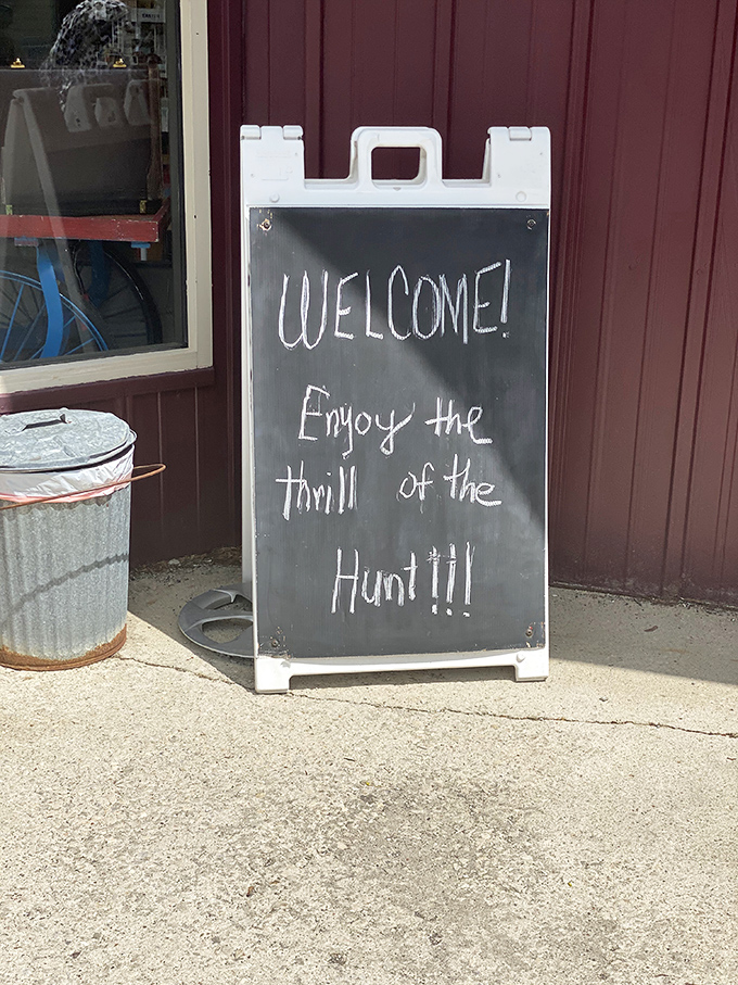 "Enjoy the thrill of the hunt!" promises the welcome sign, perfectly capturing the addictive joy of antique shopping in just six words.
