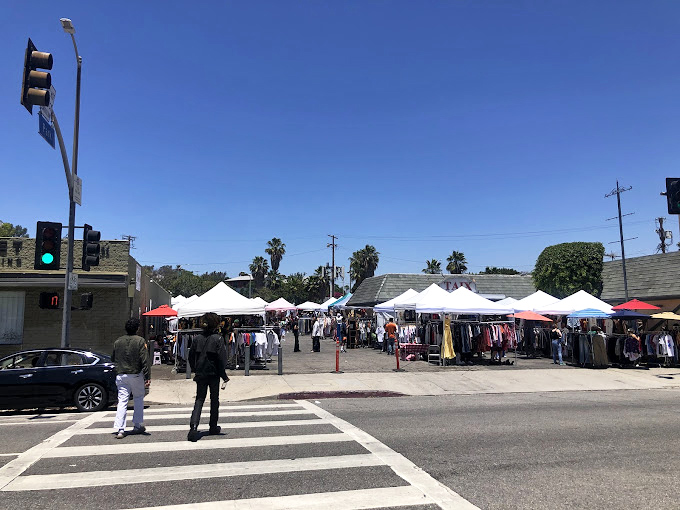 The wide view reveals organized chaos where every tent holds potential treasures waiting for discovery.