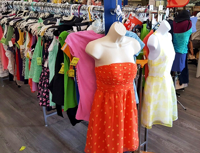 Dresses standing at attention, a rainbow of fabrics and styles waiting for their next night out or backyard barbecue.