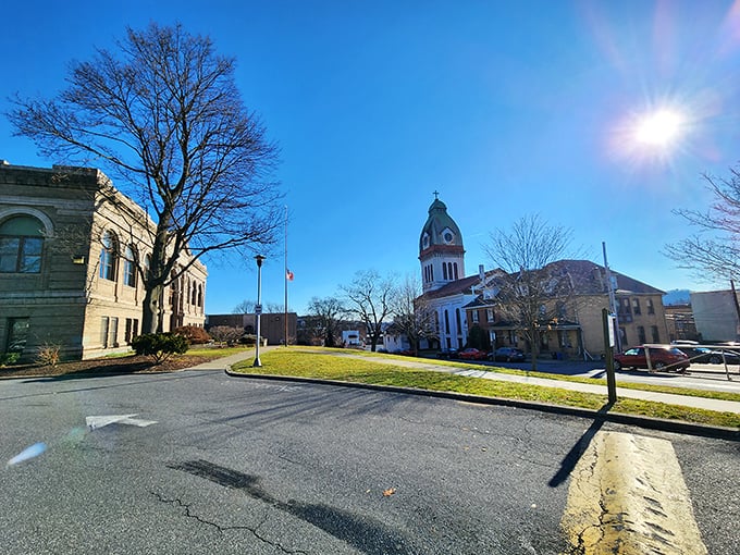 The courthouse square buzzes with small-town energy where locals have gathered for over two centuries.