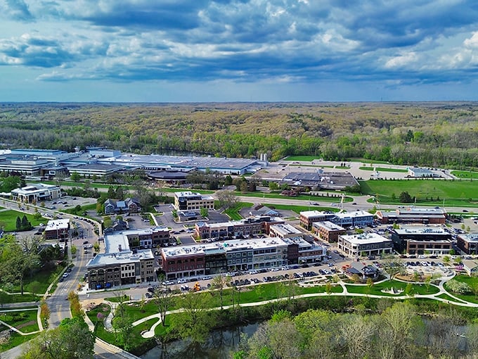 Ada Township: Aerial view reveals Ada's perfect balance of small-town charm and green spaces. Where Thornapple River meets community spirit!
