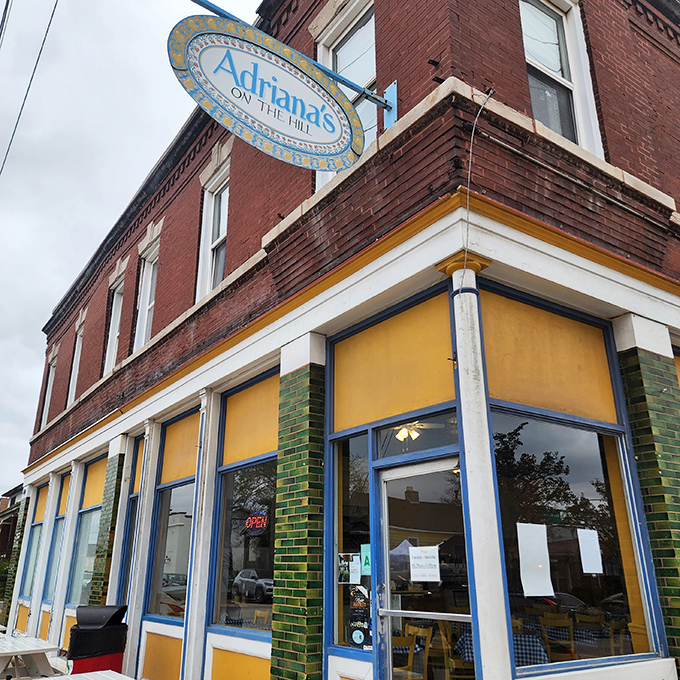 The iconic blue sign of Adriana's beckons from this brick corner building like an Italian grandmother calling you home for dinner.