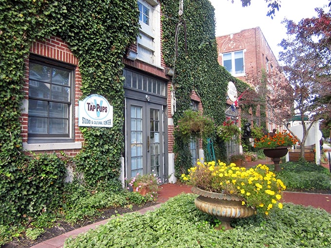 Ivy-draped brick and blooming flowers welcome treasure hunters to this charming marketplace. Nature's perfect frame for vintage finds!