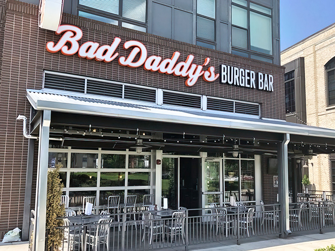 Bad Daddy's exterior beckons with its bold signage and inviting patio &ndash; a temple to burger worship where calories don't count.