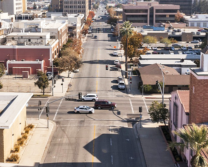 Downtown Bakersfield stretches out like a welcoming handshake, where wide streets mean you'll never stress about parking again!