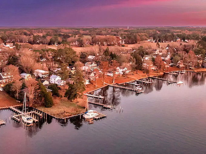 Bath's waterfront at sunset looks like nature's own watercolor painting, with boats resting peacefully along the shoreline.