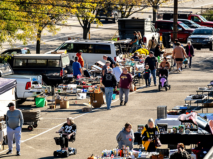 Treasure hunters navigate a sea of tables at Butler Flea Market. The thrill of the hunt is alive in every aisle!