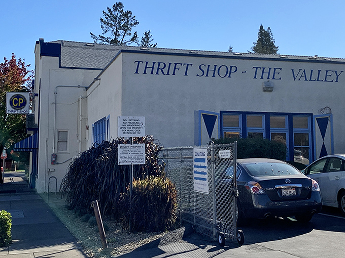 The blue-trimmed exterior of CP Thrift Shop stands like a bargain beacon in Napa, promising treasures within those unassuming walls.