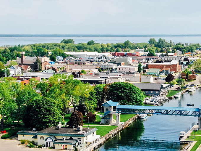 Cheboygan's waterfront charm on full display! The river meets downtown in this perfect postcard view of small-town Michigan magic.