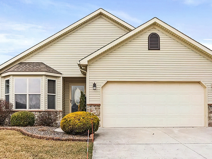 Picture-perfect retirement living where golden landscaping meets practical elegance, like finding your dream home without the mortgage stress.