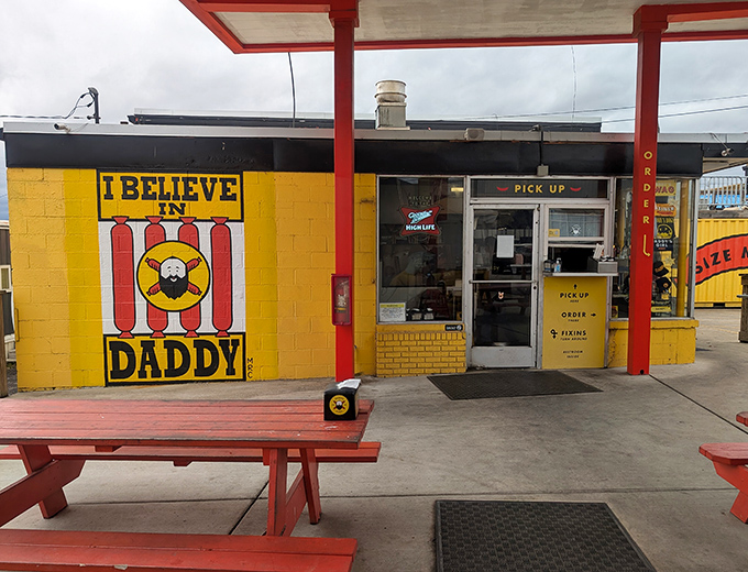 The bright yellow "I BELIEVE IN DADDY" wall isn't just Instagram-worthy&mdash;it's a beacon calling all hot dog enthusiasts to their happy place.