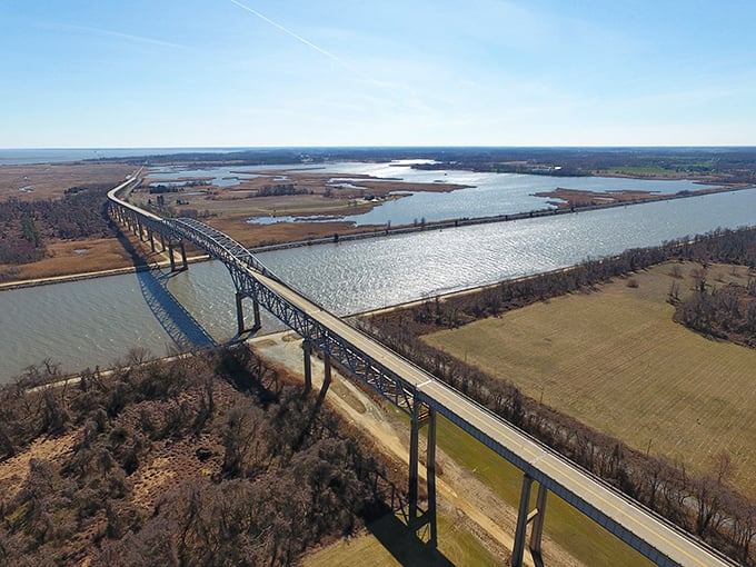 The magnificent Chesapeake & Delaware Canal Bridge stretches across the water like a steel rainbow, connecting shores and spirits alike.