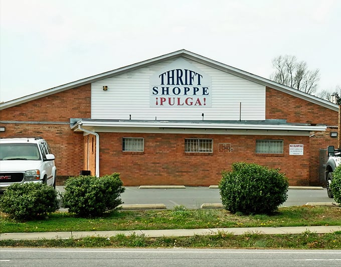The brick facade of Durham Rescue Mission Thrift Store promises treasures within, like a humble vault hiding priceless artifacts.