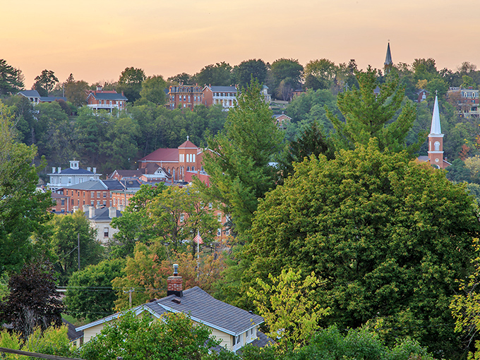 Galena's hillside vista at sunset - church spires and historic buildings create a scene that whispers stories from another century.